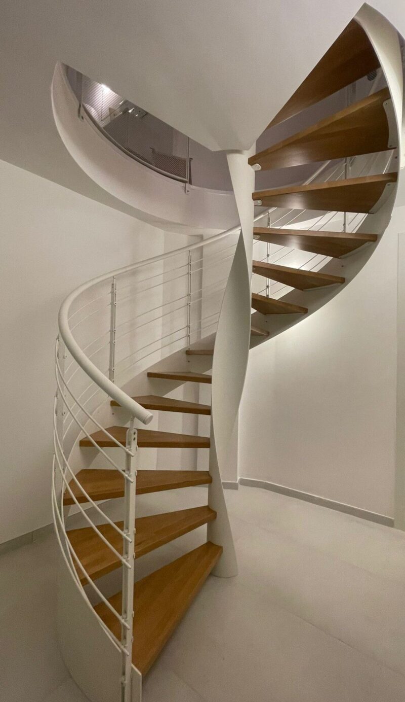 Wave ong & Wave twisted pole staircase - Cast Stairs